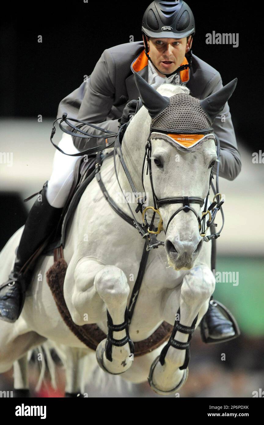 Germany's Marco Kutscher on Cornet Obolensky on his way to the first ...