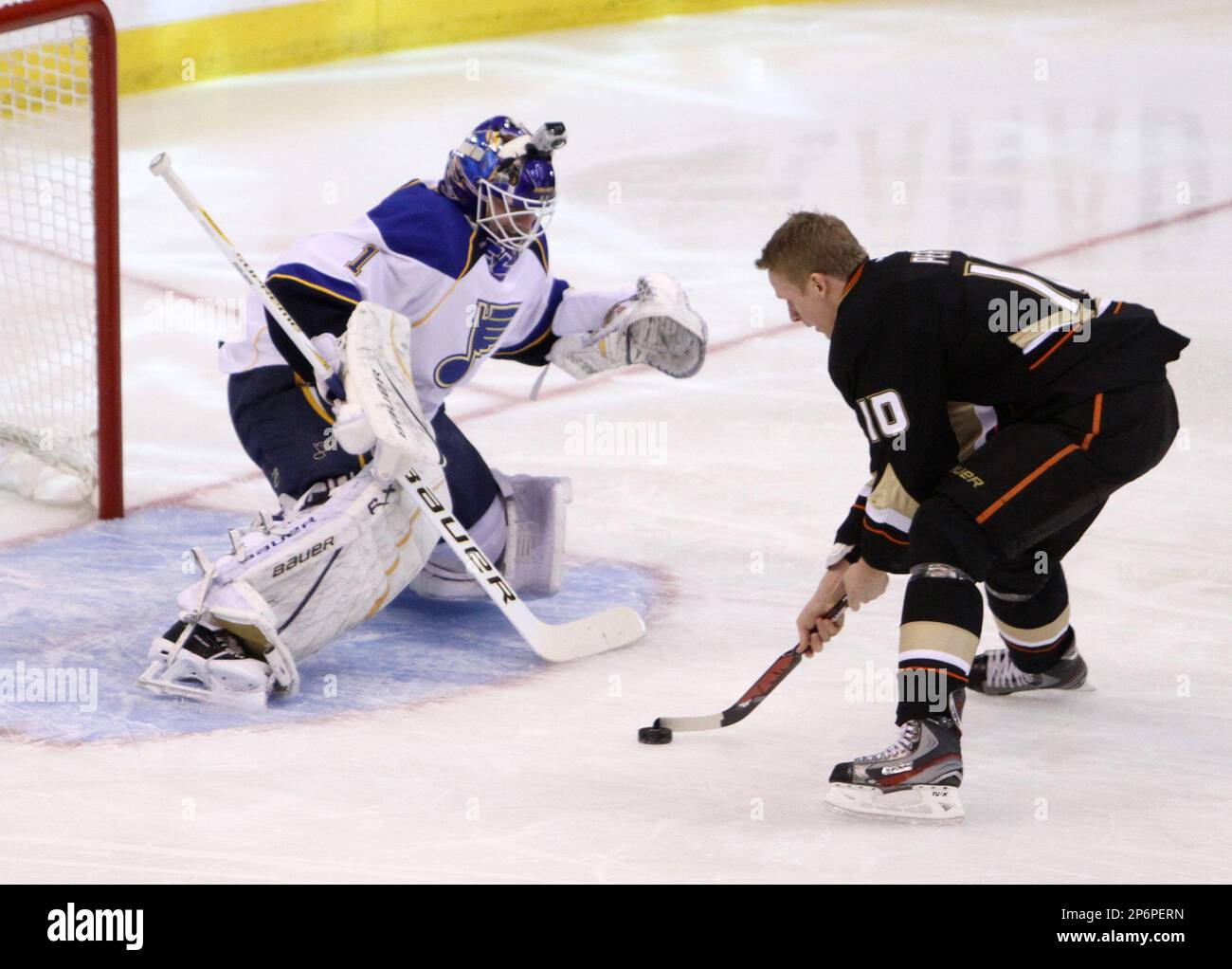 Anaheim Ducks' Corey Perry, right, uses a miniature stick during the ...