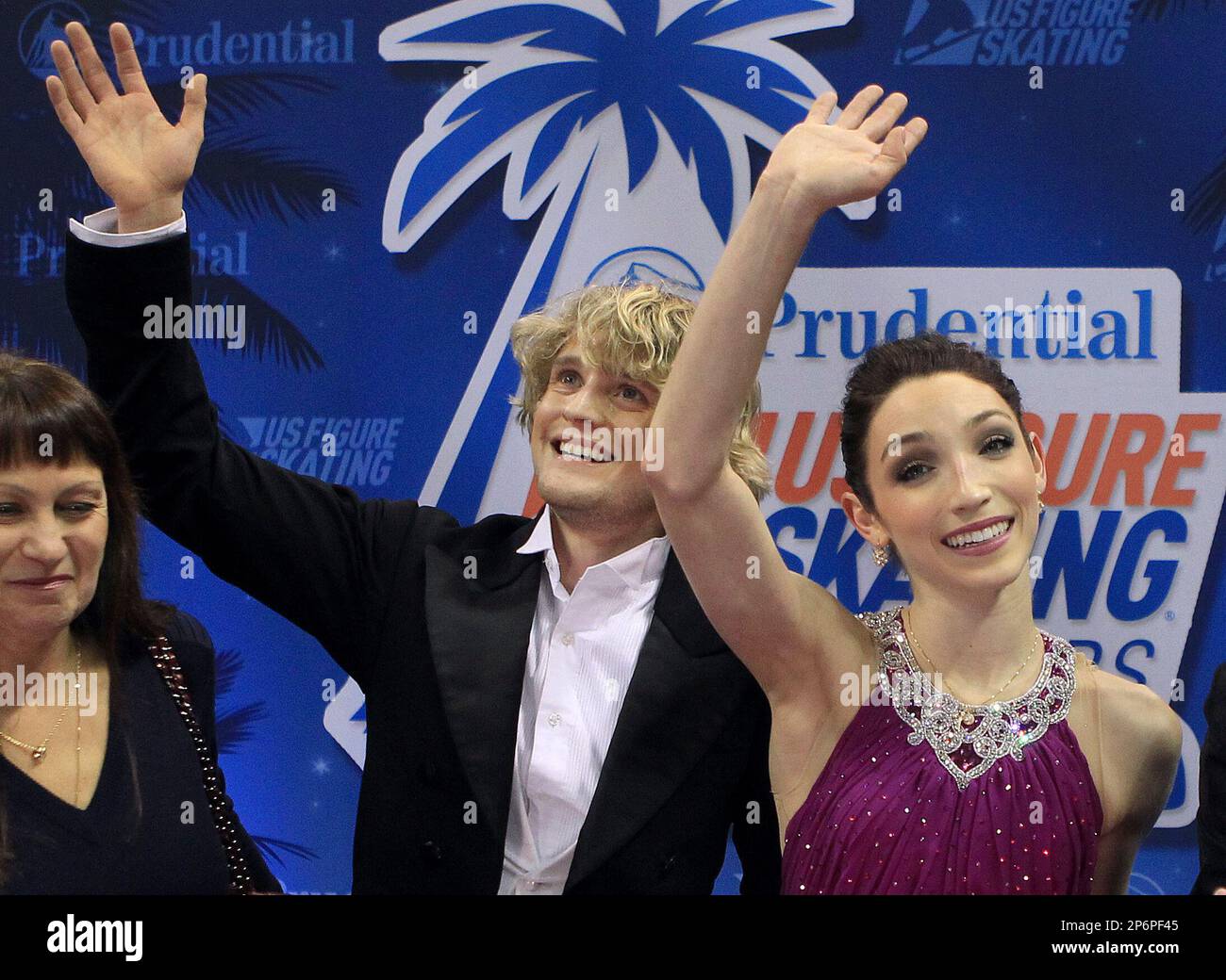 Charlie White and Meryl Davis wave after seeing their scores in the ice ...