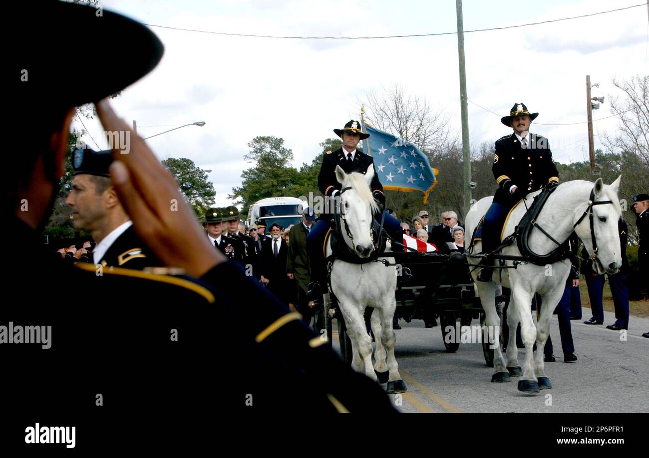 Soldiers line the route of the caisson procession in Fort Jackson, for ...