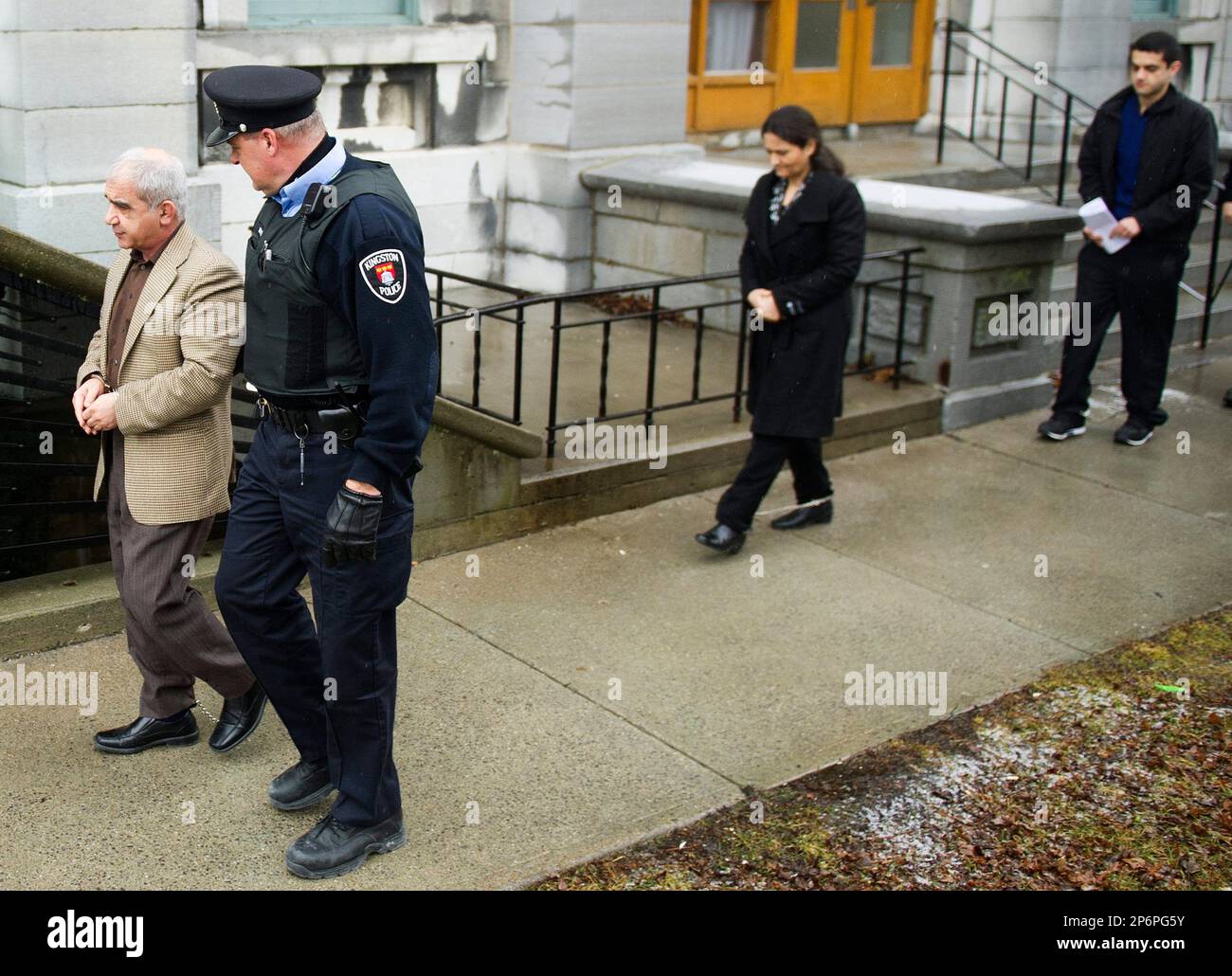 Mohammad Shafia, left, Tooba Yahya, center, and their son Hamed Shafia ...