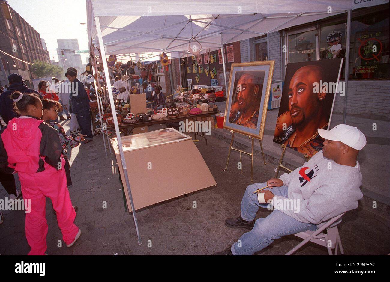 Local artist Gerald Ivey sells portraits of the late rapper Tupac ...
