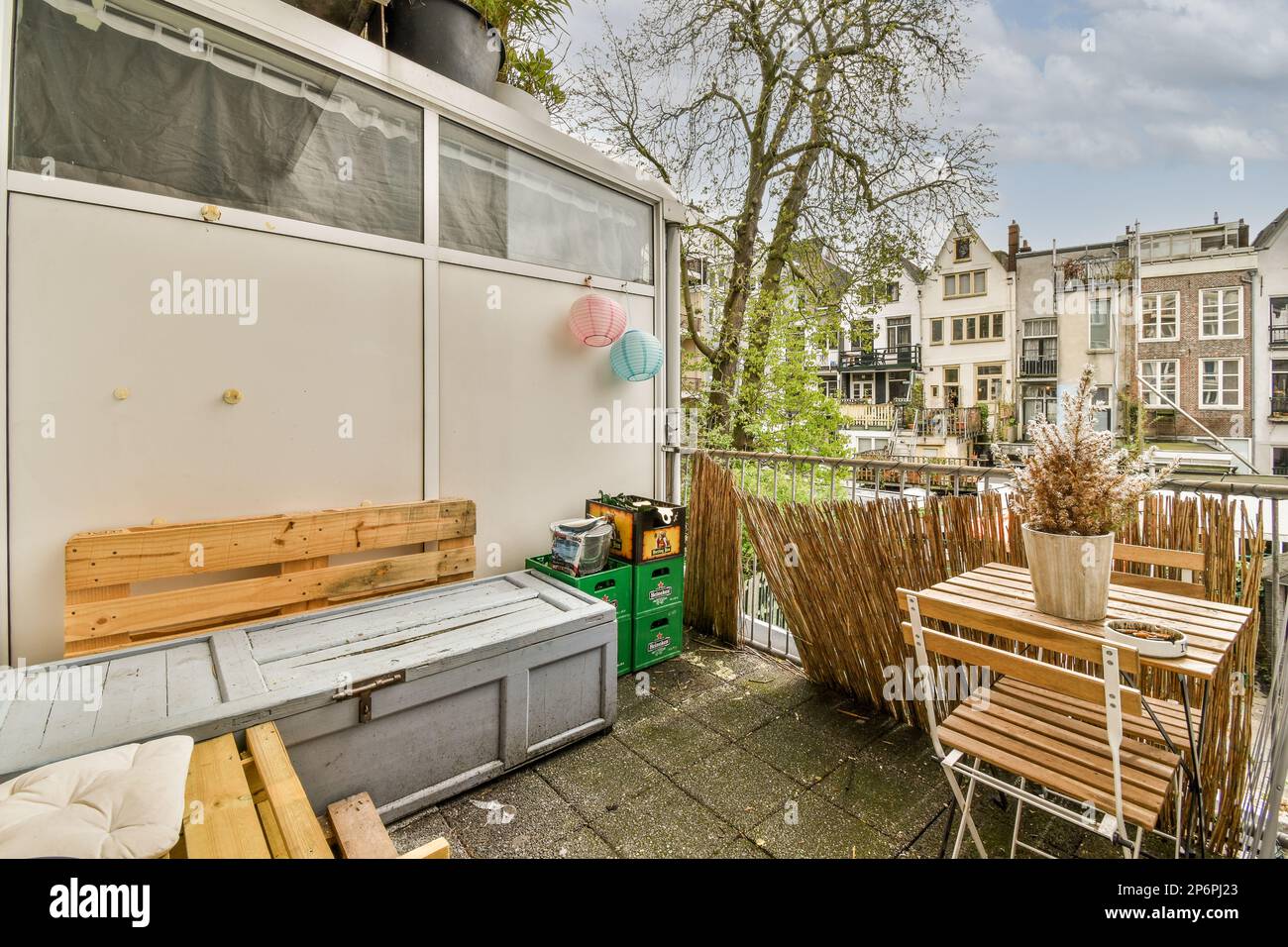 an outside area with some furniture and trees in the fore - image was ...