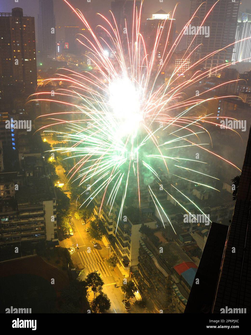 People launch fireworks to celebrate the Spring Festival in Chengdu in ...