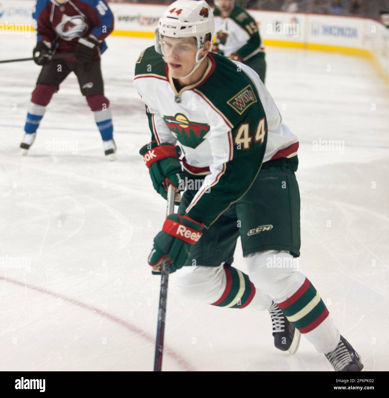 January 24, 2012: Minnesota's Justin Falk brings the puck into the ...