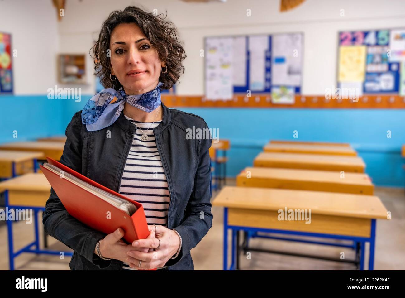Female teacher in class room hi-res stock photography and images - Alamy