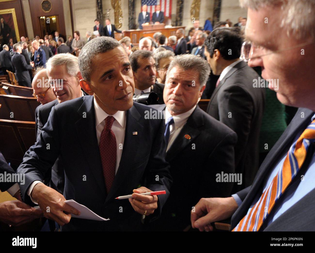 President Barack Obama signs autographs following his State of the ...