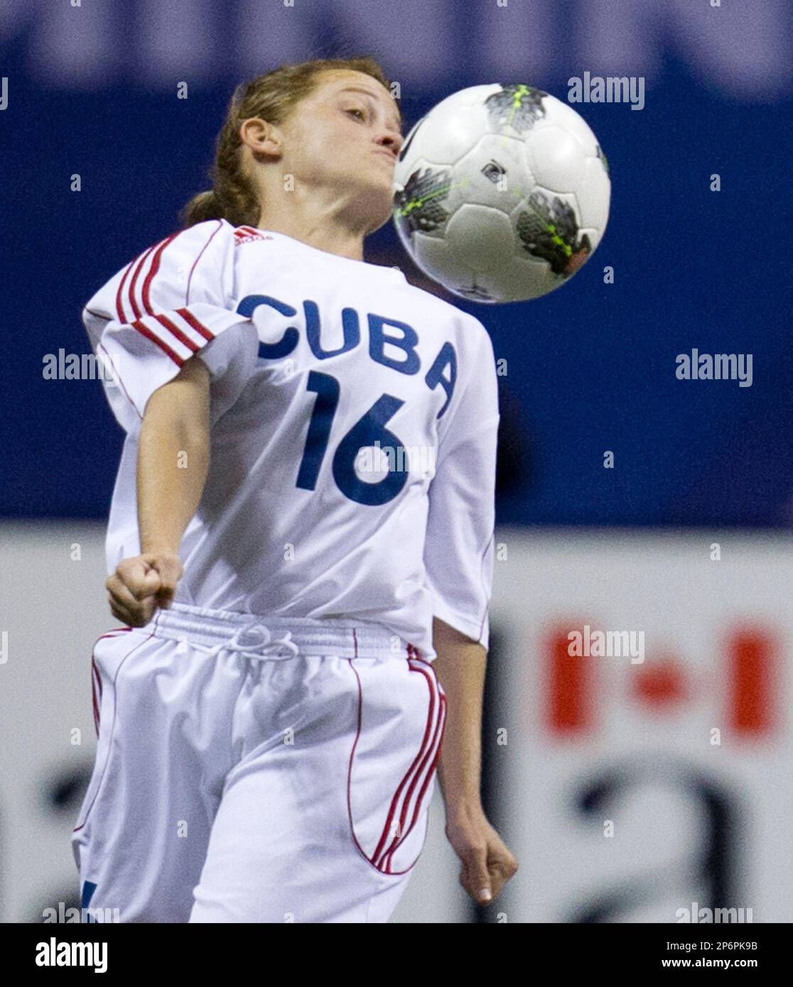 In this Jan. 17, 2012, photo, Cuba's Yisel Rodriguez plays the ball in ...