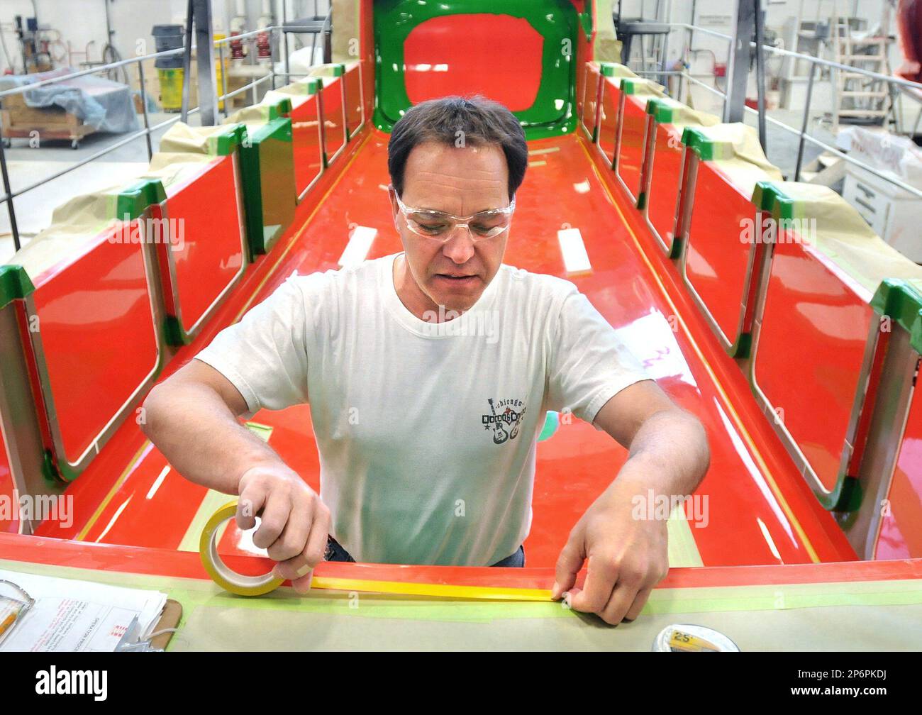 In this May 18, 2010 photo, Energetx Composites employee Bryan Ritterby ...