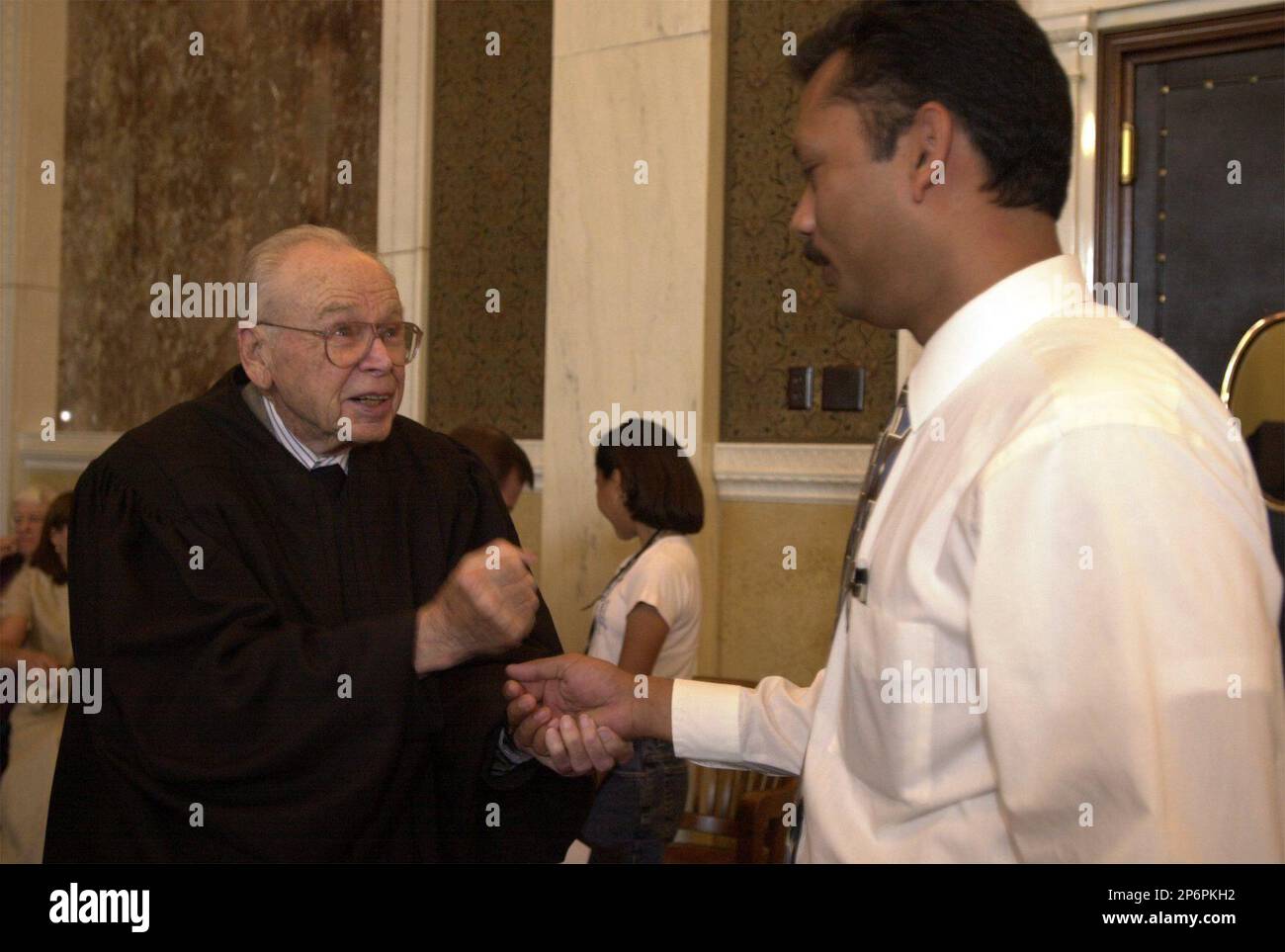 FILE - In this June 15, 2000 photo, Judge Wesley Brown shakes hands ...