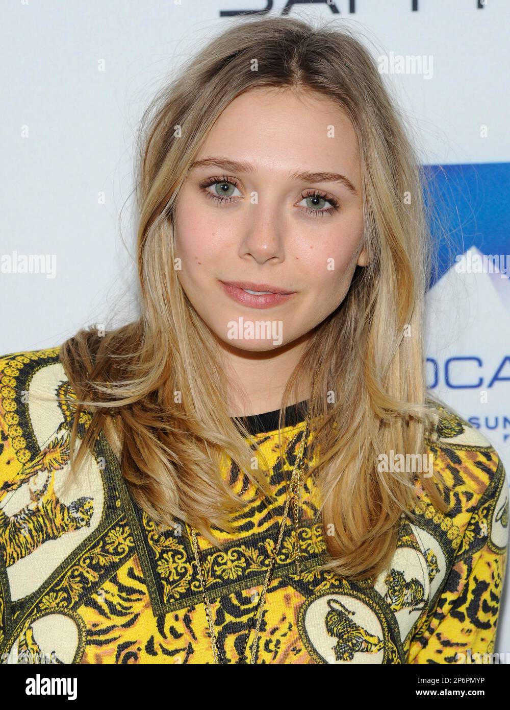 In a photo provided by Chase Sapphire actress Elizabeth Olsen attends ...