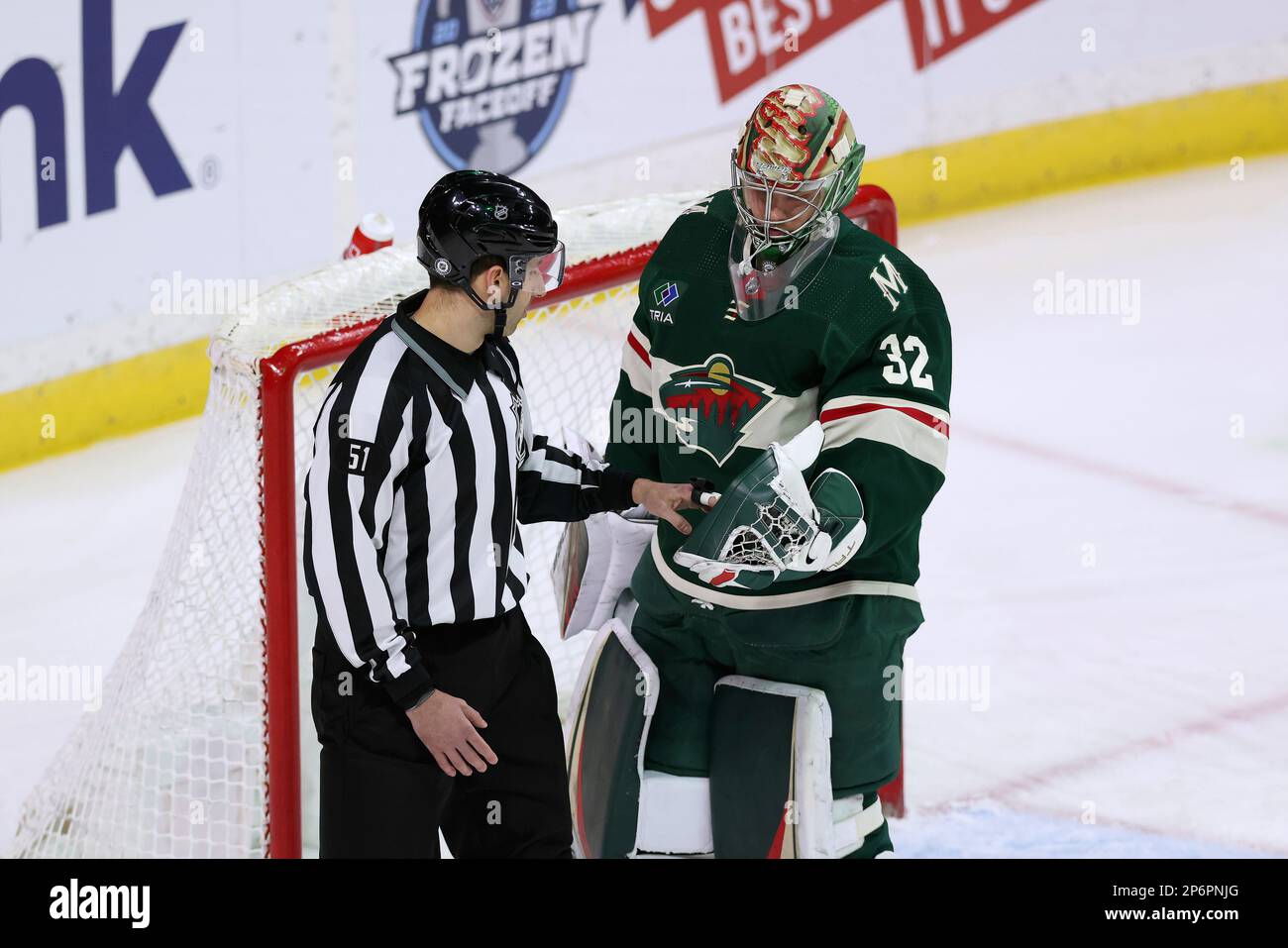 Minnesota Wild goaltender Filip Gustavsson (32) hands off the puck ...