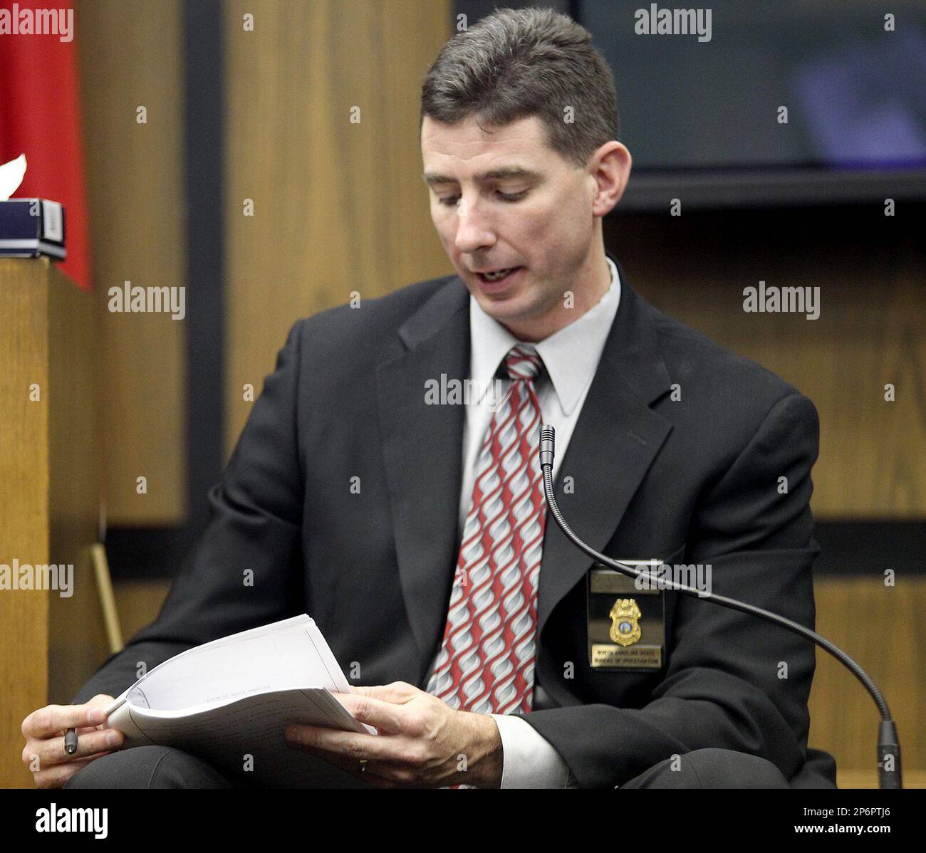 SBI agent John Kaiser reads a transcript of an interview with Dwight ...