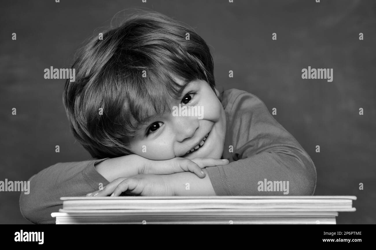 Back to school and happy time. Little student boy happy with an ...