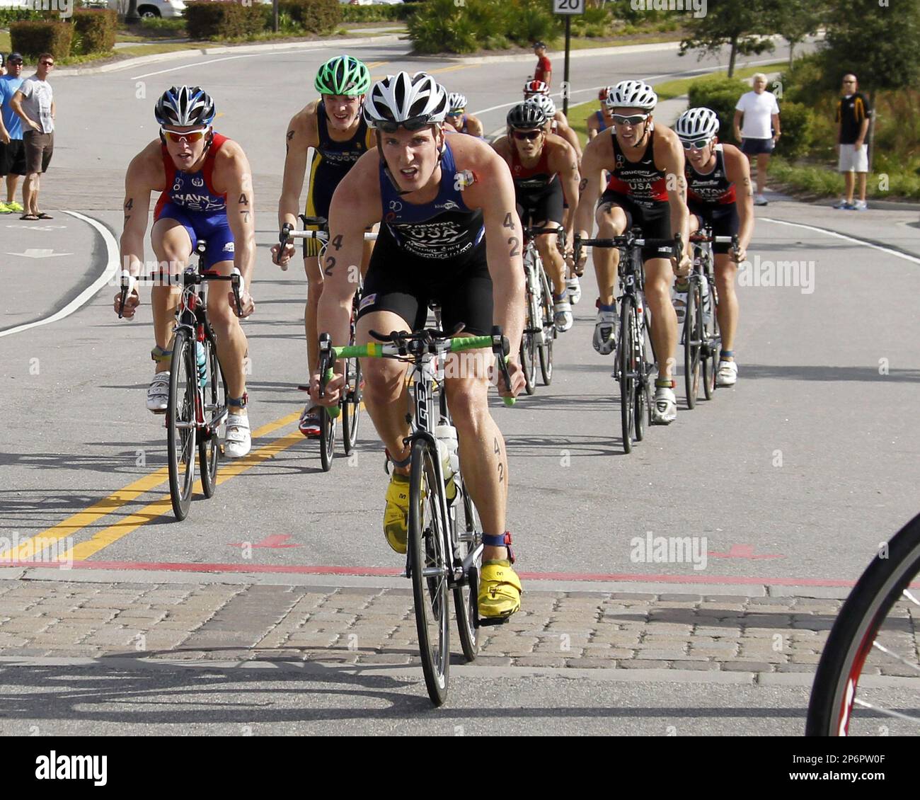 William Huffman, of Dallas, Texas, leads the chase group in the bike ...