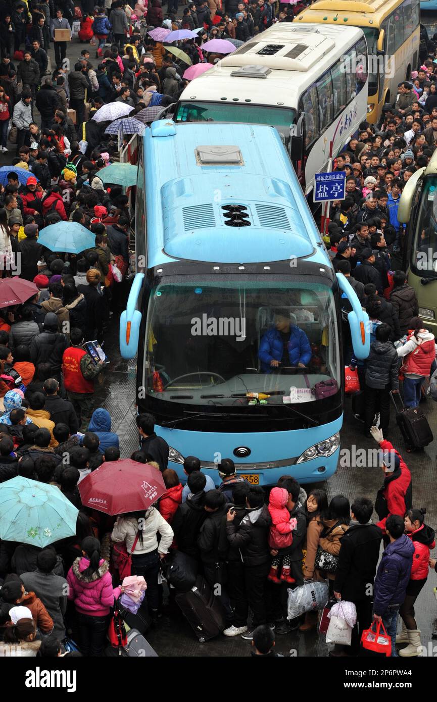 Passengers crowd ba long distance bus station in Chengdu in Southwest ...