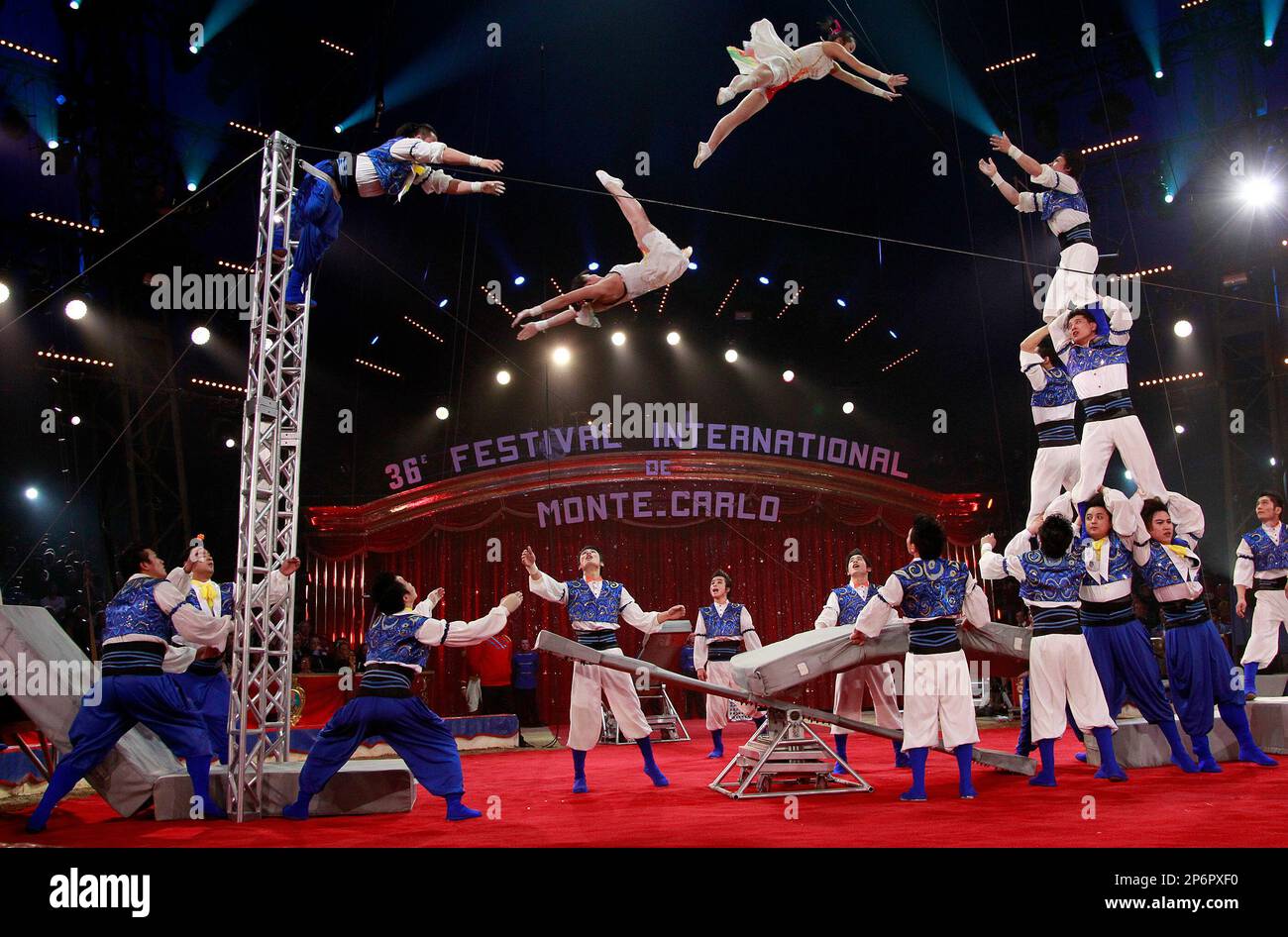 The acrobatic troupe of Shanghai performs during the opening ceremony ...