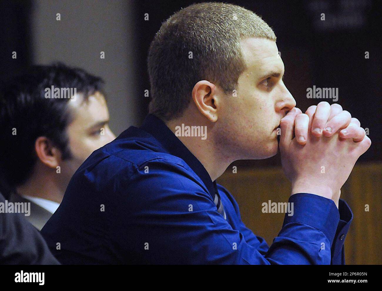 In this Tuesday, Jan. 17, 2012 photo, Ronald Saunders sits with his ...