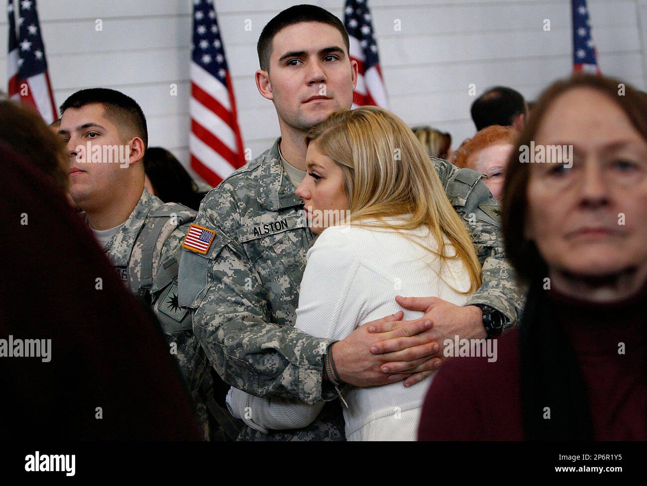 Stephen Alston holds his sweetheart Ali Azemar as he and other soldiers ...