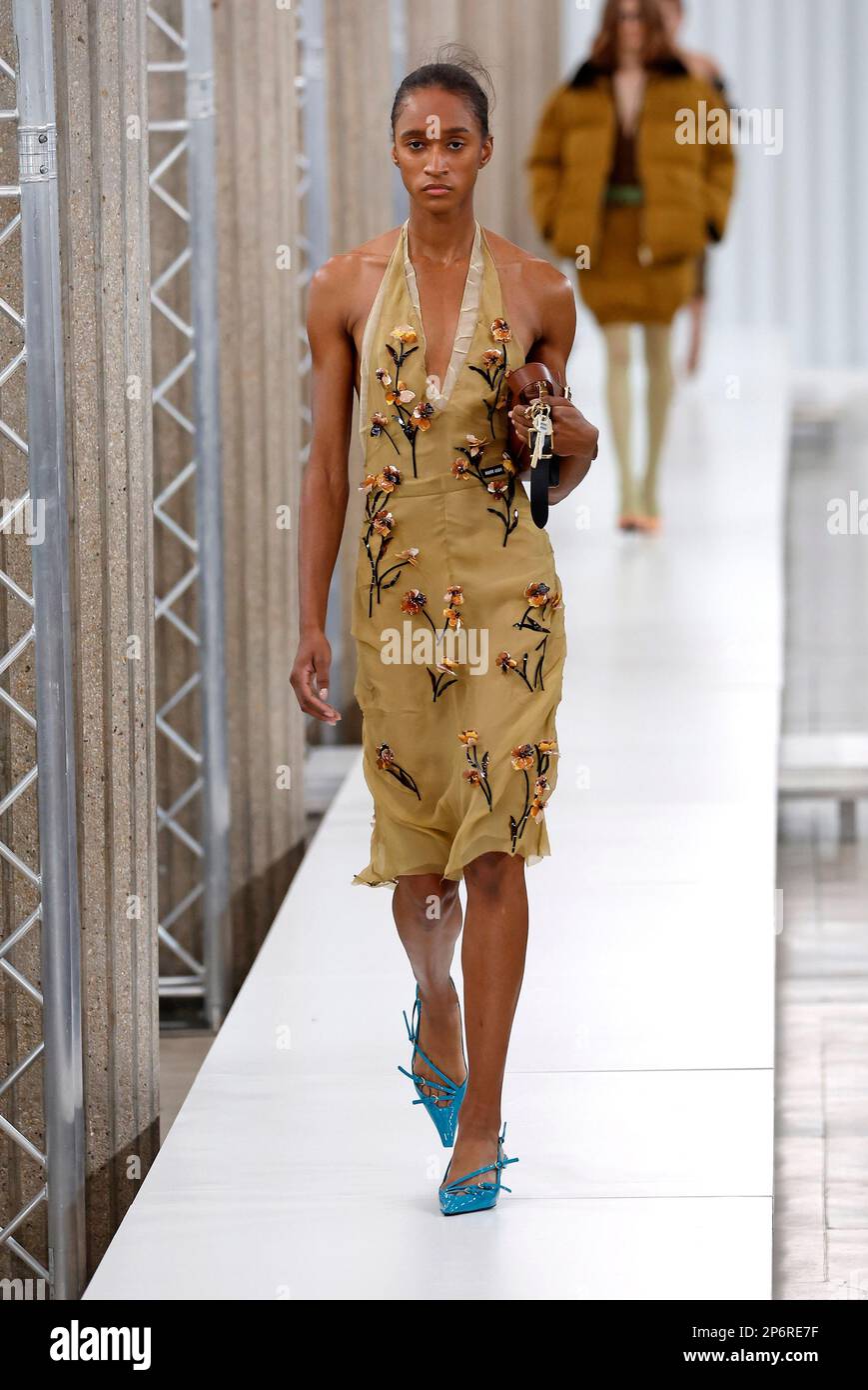 PARIS, March 8, 2023 (Xinhua) -- A model presents a creation by Miu Miu ...