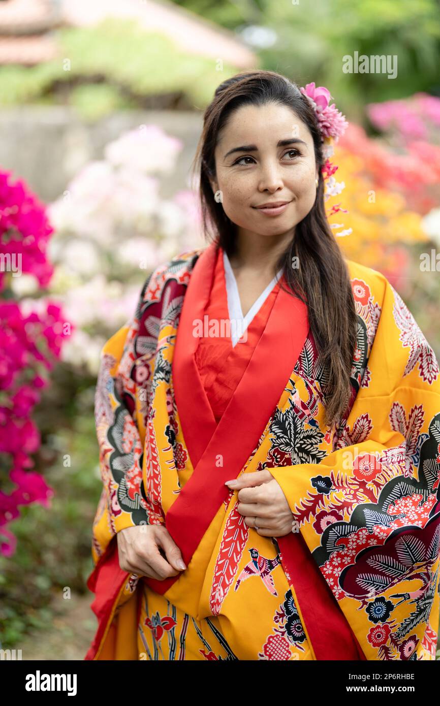 Woman wearing Uchinaasugai, Ryusou, Ryuso, traditional dress of Ryukyu ...