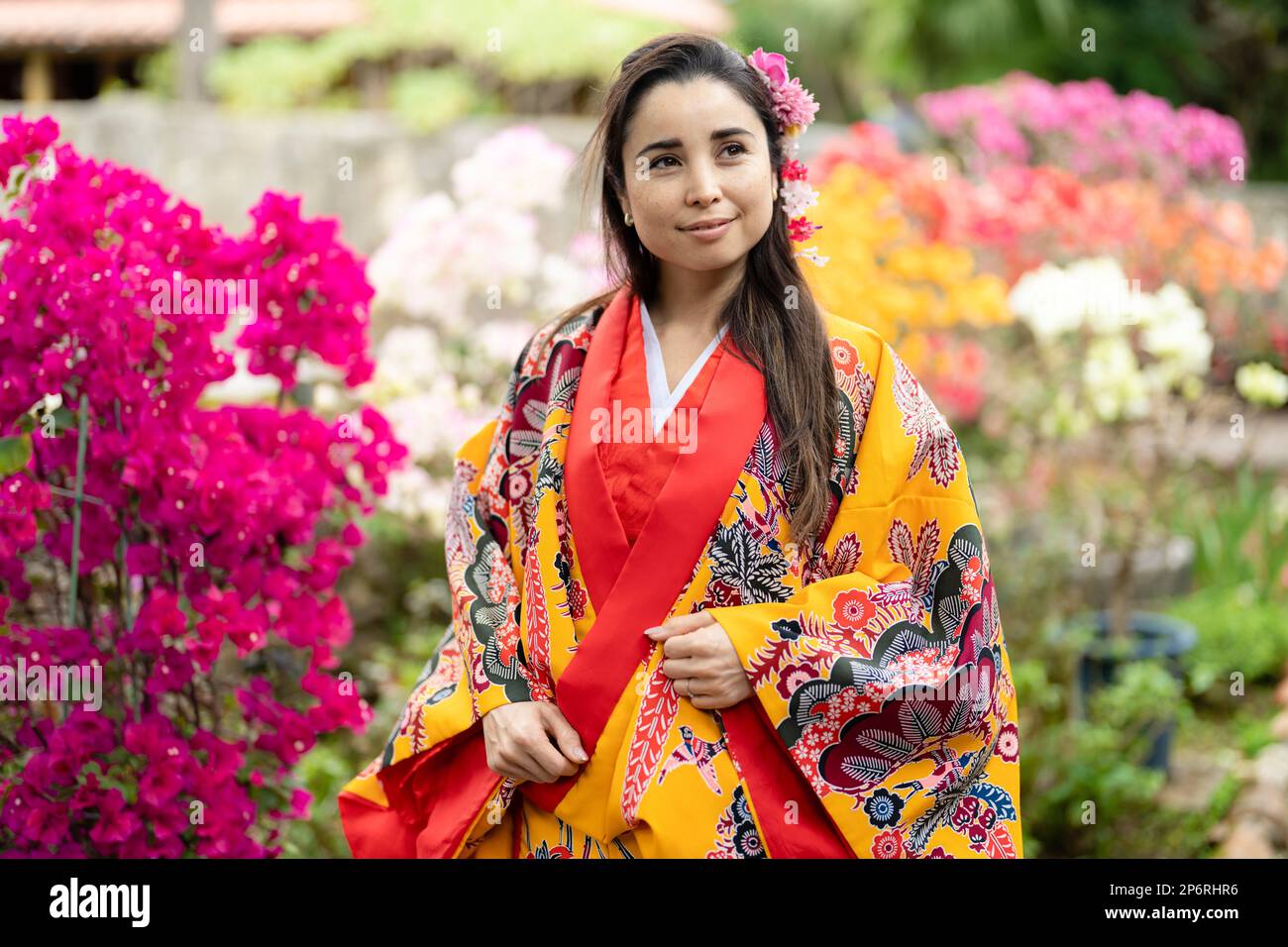 Woman wearing Uchinaasugai, Ryusou, Ryuso, traditional dress of Ryukyu ...