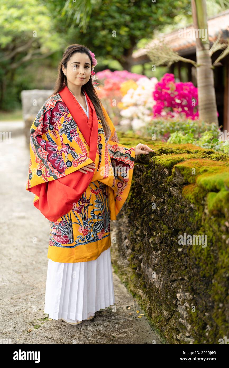 Woman wearing Uchinaasugai, Ryusou, Ryuso, traditional dress of Ryukyu ...