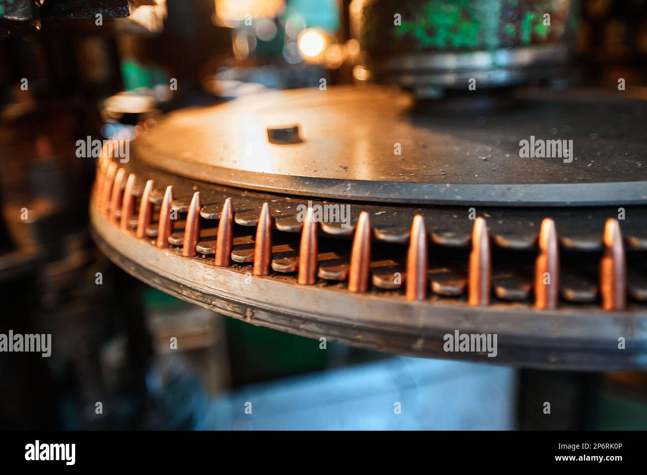 Bullets transported by production line at ammo factory Stock Photo - Alamy