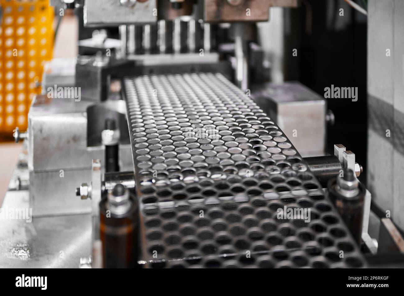 Cutting of steel blanks from metal strip on stamping press Stock Photo ...