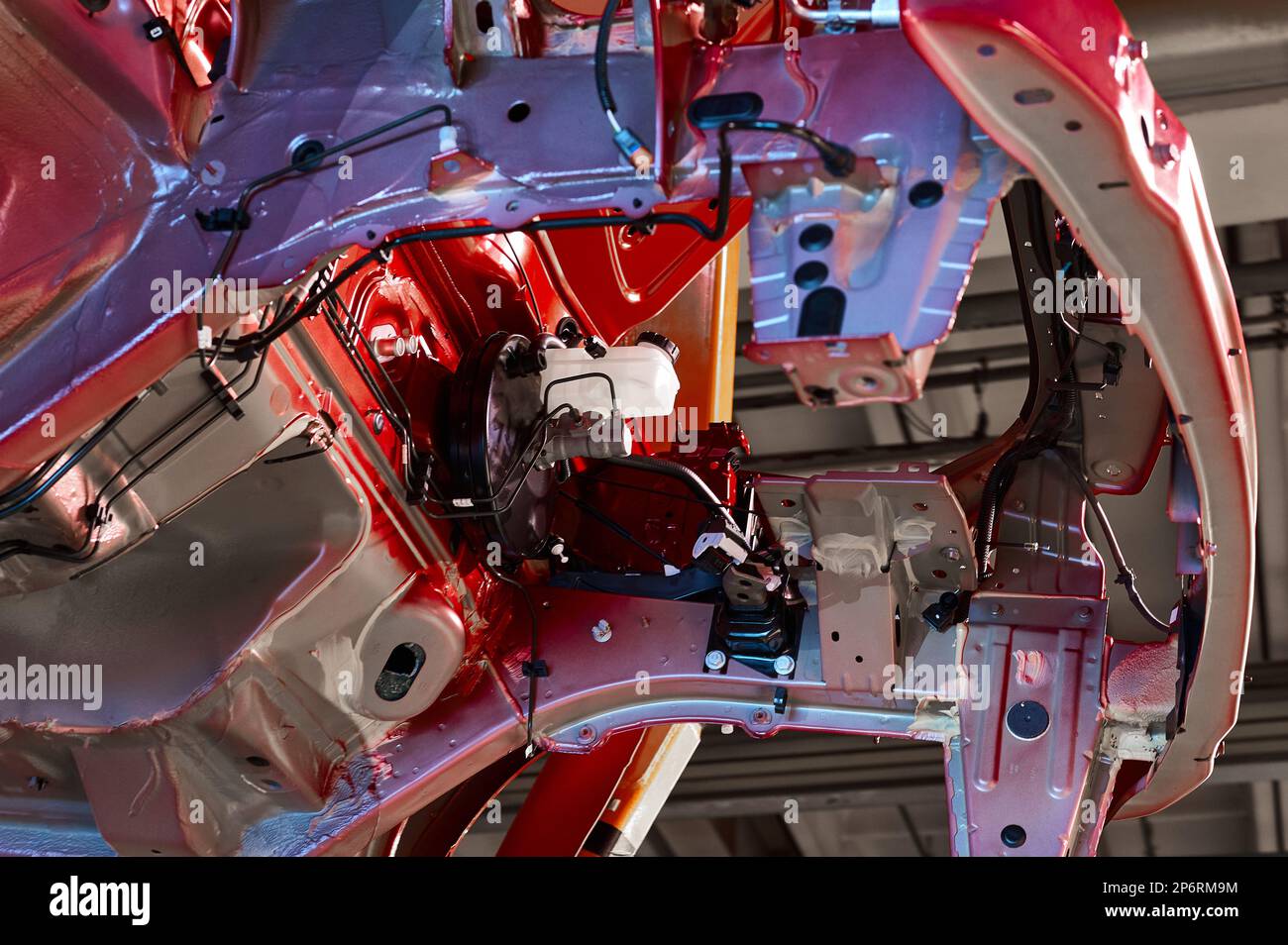 Open car bay with vacuum assisted brakes and engine at plant Stock ...
