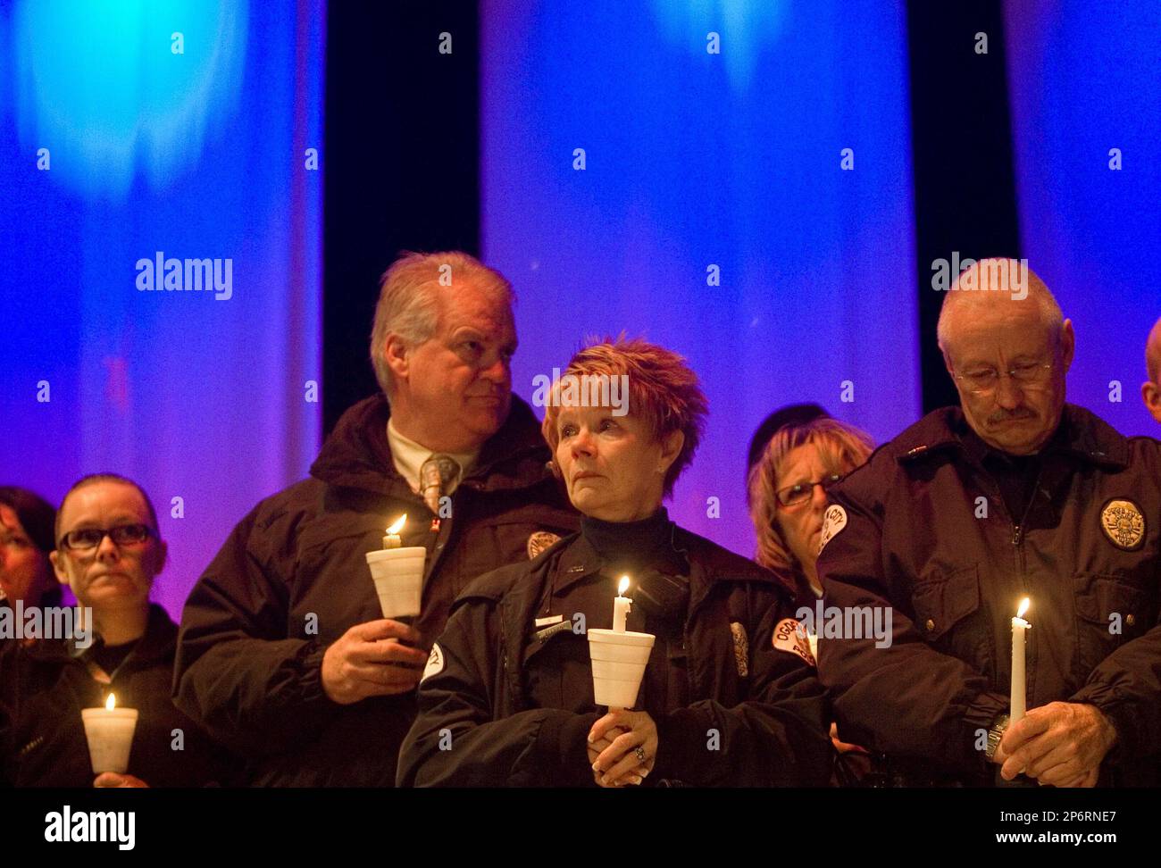 Public Safety officers gather on stage of Ogden Amphitheater during a ...