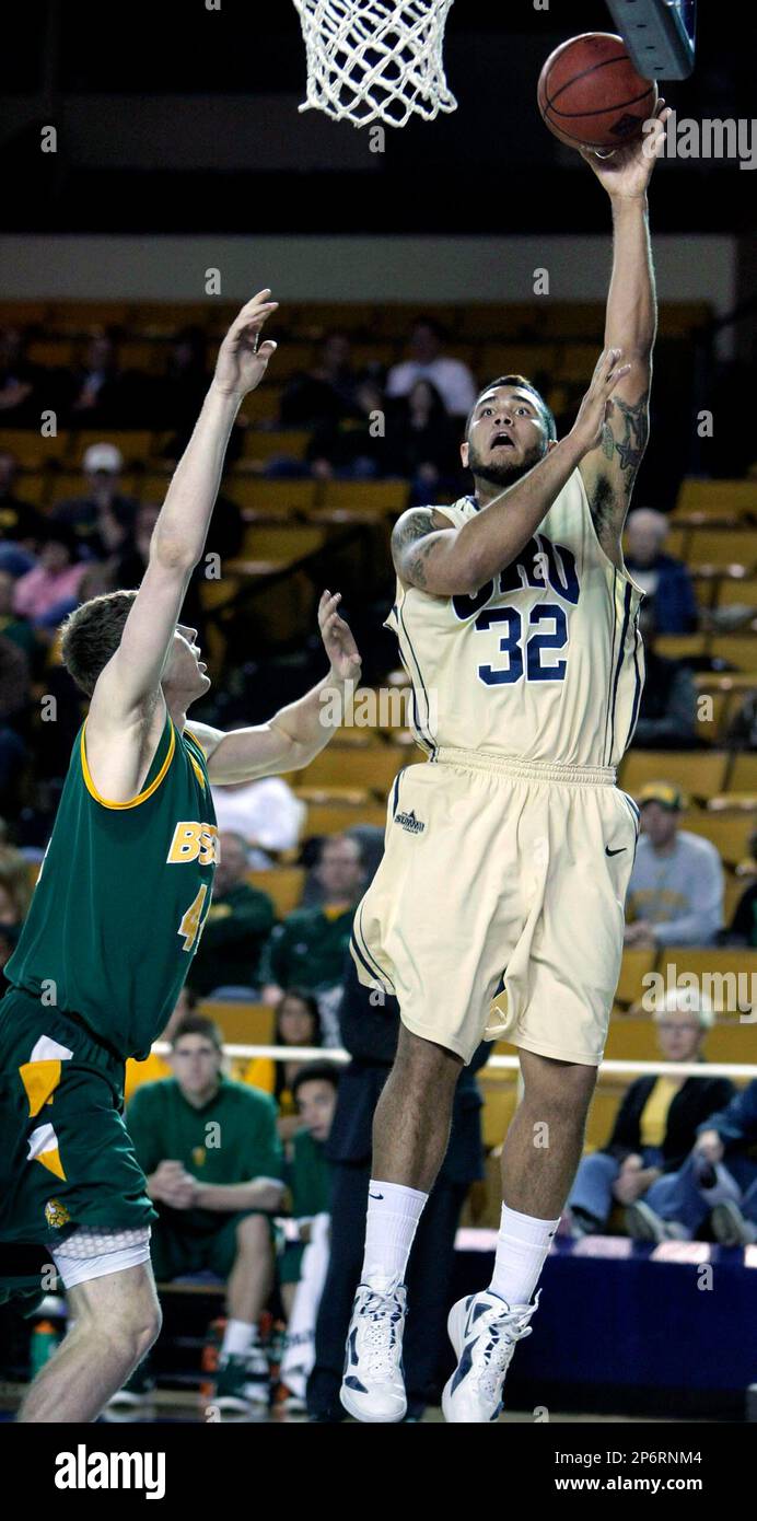 Oral Robert's Damen Bell-Holter, right, puts up a shot against North ...