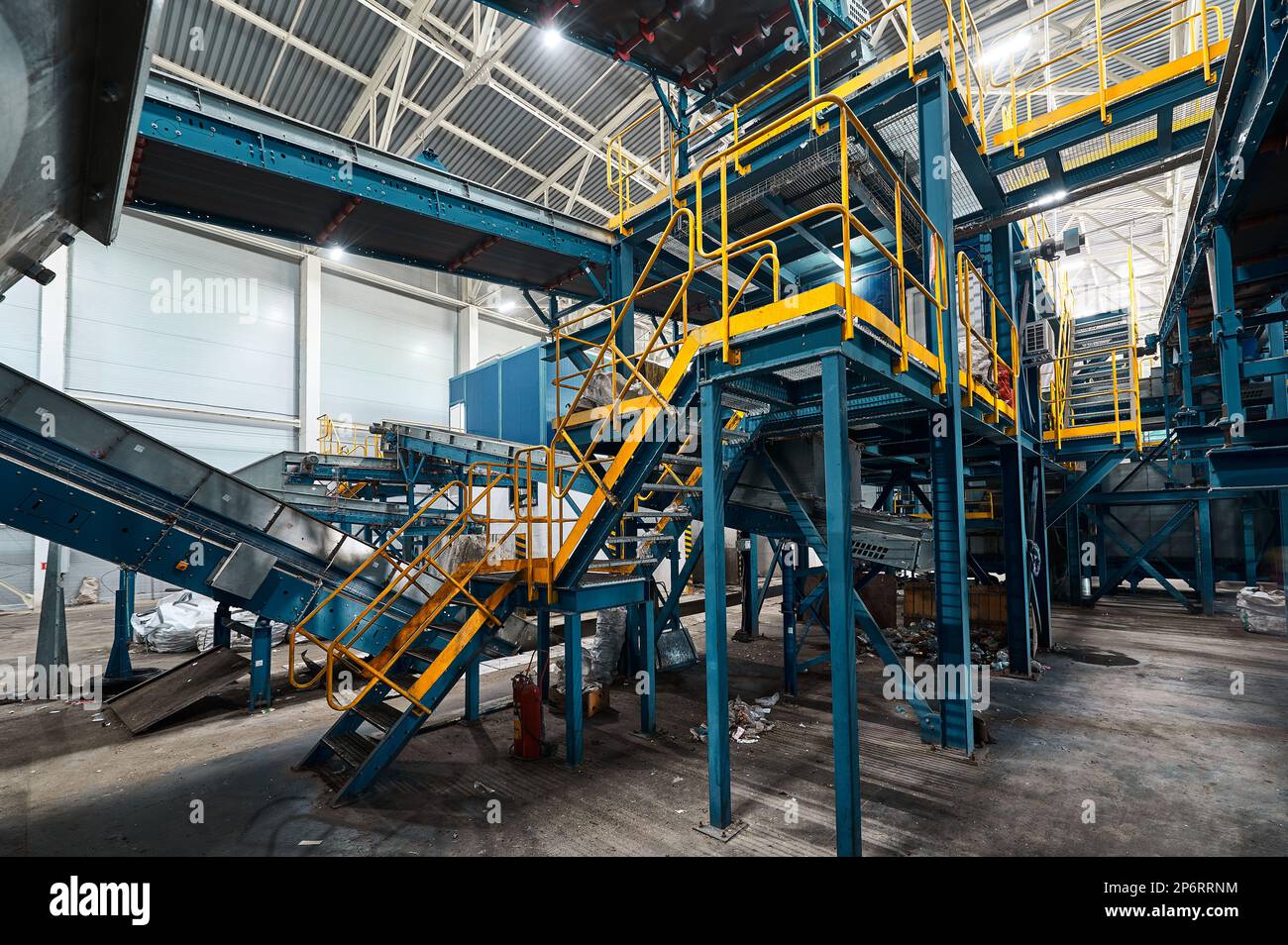 Large production line with conveyors carrying trash at plant Stock Photo - Alamy