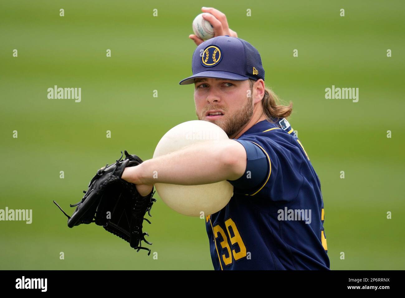 Milwaukee Brewers starting pitcher Corbin Burnes (39) warms up before a ...
