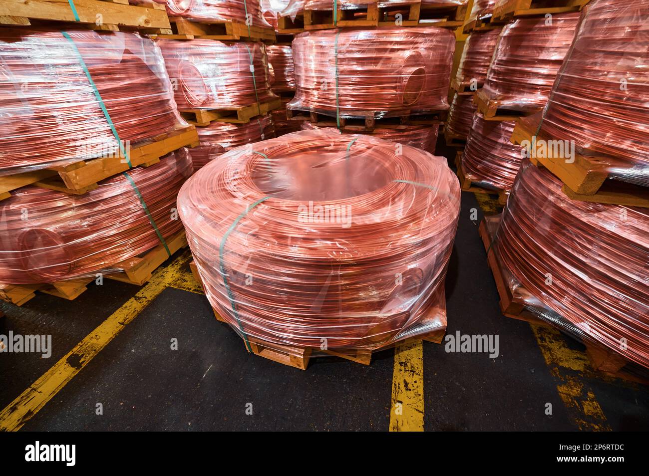 Stacks of copper wire rods in production plant warehouse Stock Photo ...