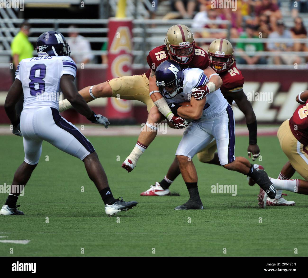 Northwestern University Wildcats receiver Jeremy Ebert (11) tries to ...