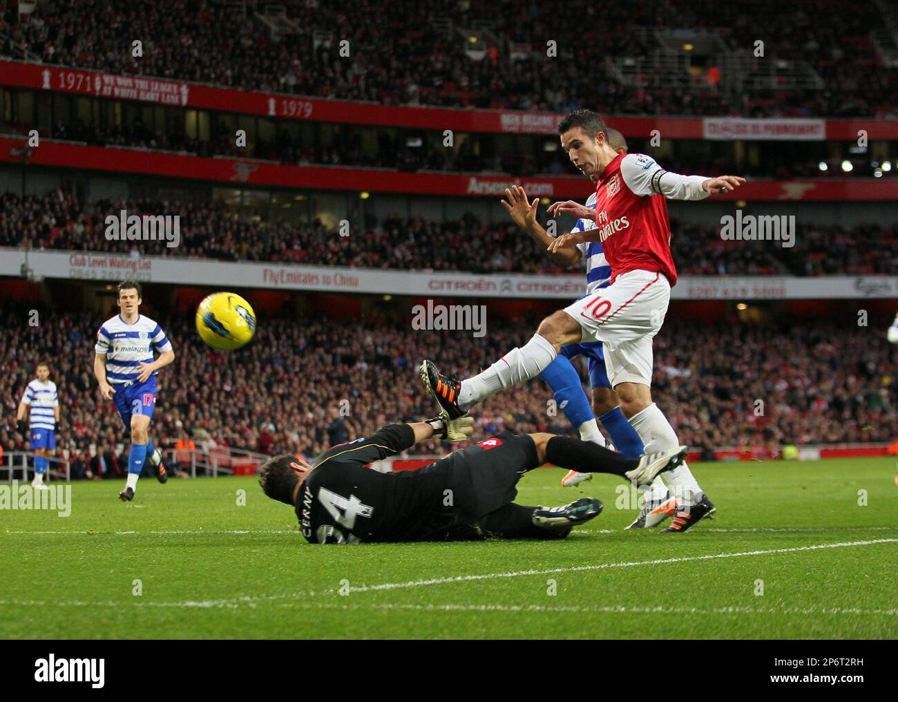 Arsenals Robin Van Persie fires a shot past QPRs Radek Cerny..Barclays ...