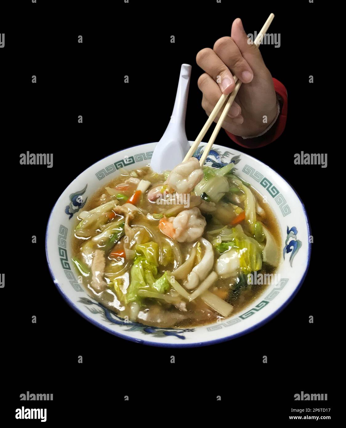 Die cut of ramen noodle soup with seafood and prawn on black isolated ...