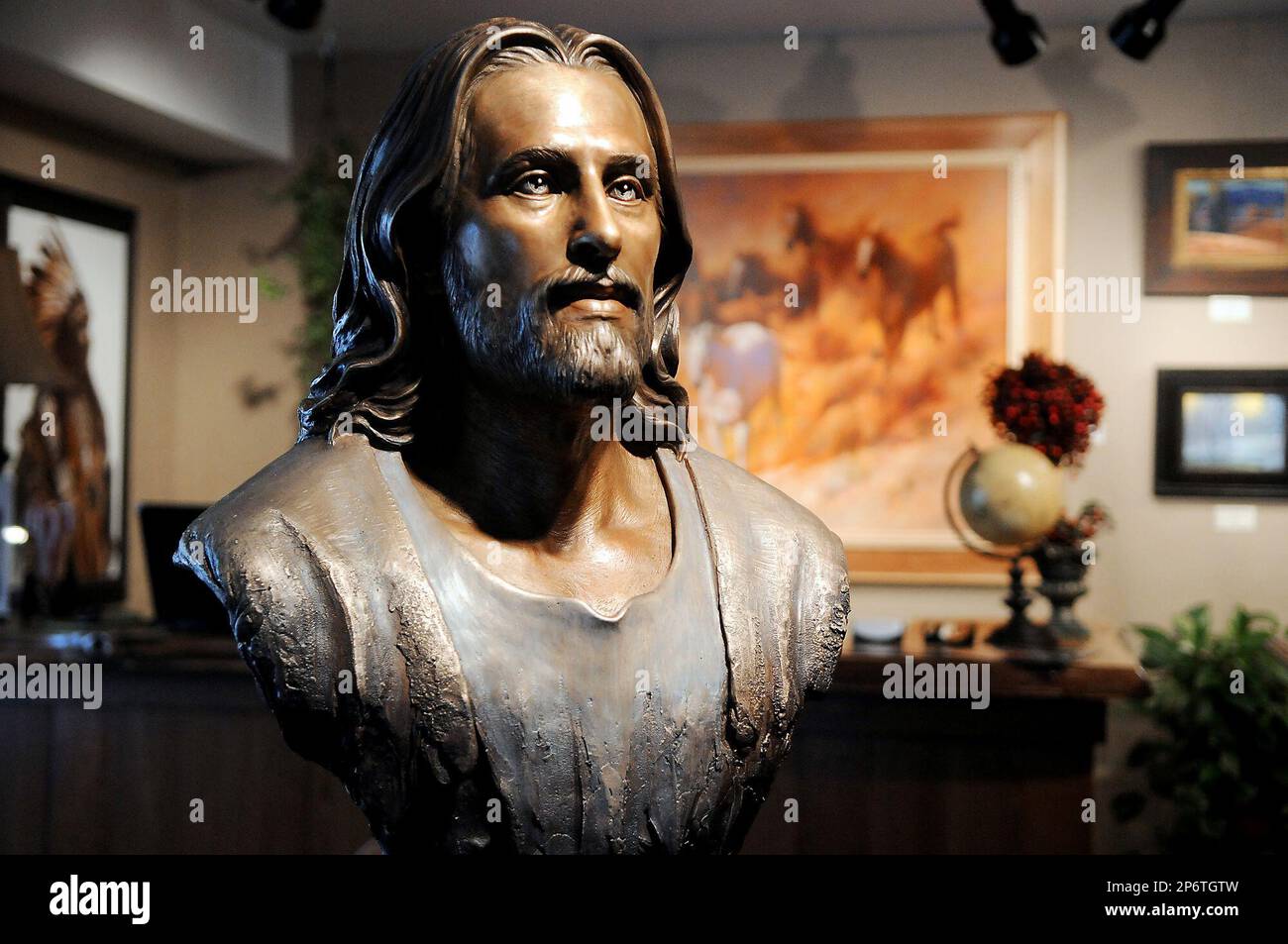 In this photo taken Dec. 21, 2011, a finished bronze of Jesus Christ by ...