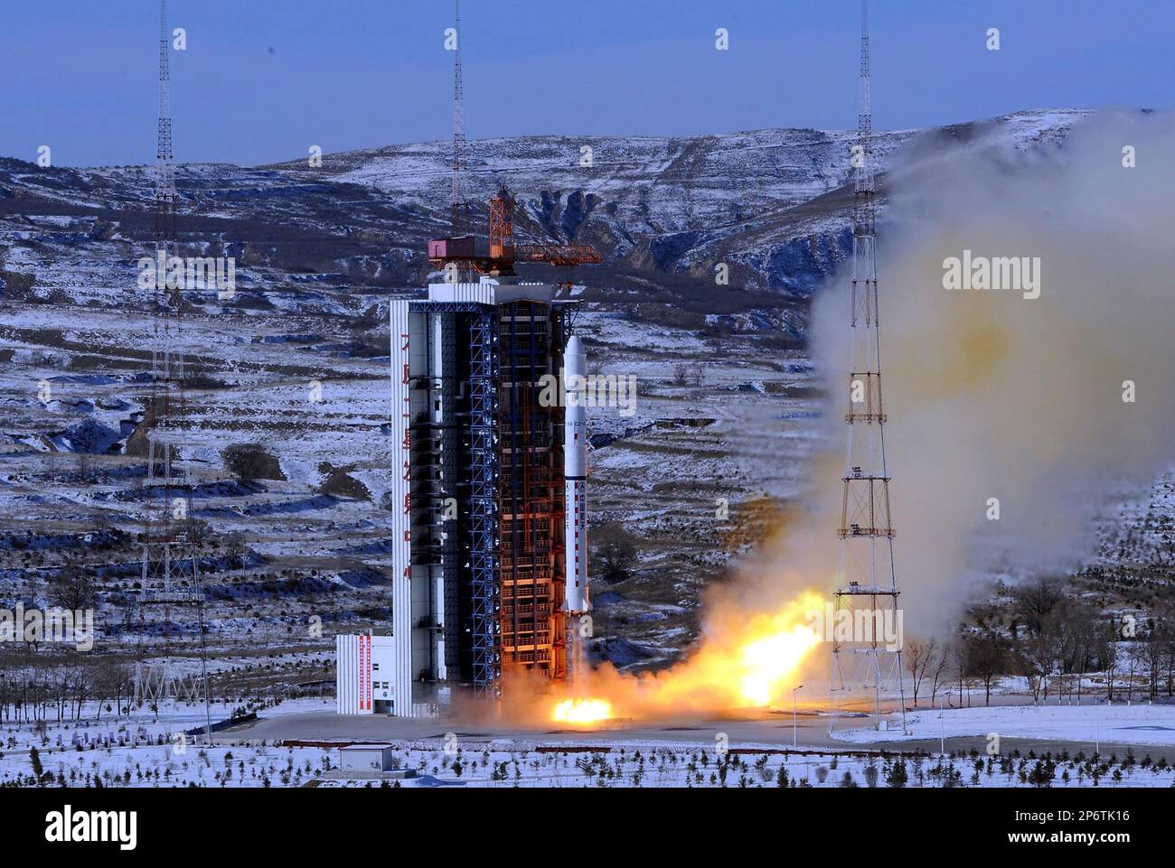 A Long March 4B rocket carrying the "Ziyuan I" 02C satellite blast off ...
