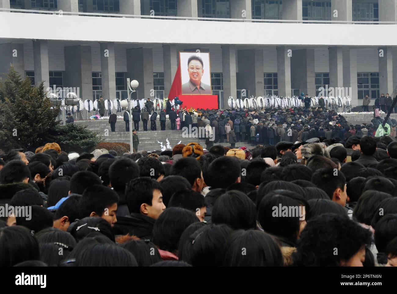 Pyongyang citizens line up to visit a portrait of late North Korean ...