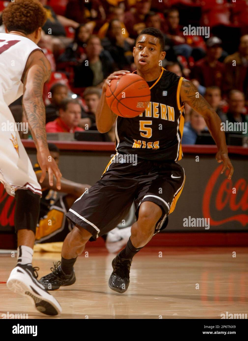 Southern Miss Golden Eagles guard Neil Watson in the first half against ...
