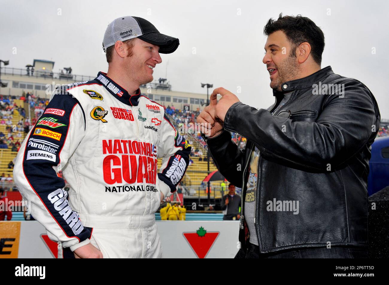 Dale Earnhardt Jr. with TV host Adam Richman from Man v Food during ...