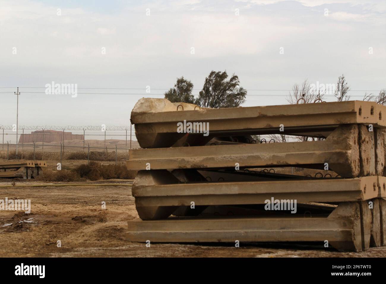 Blast walls stand piled inside Camp Adder, the last United States base ...