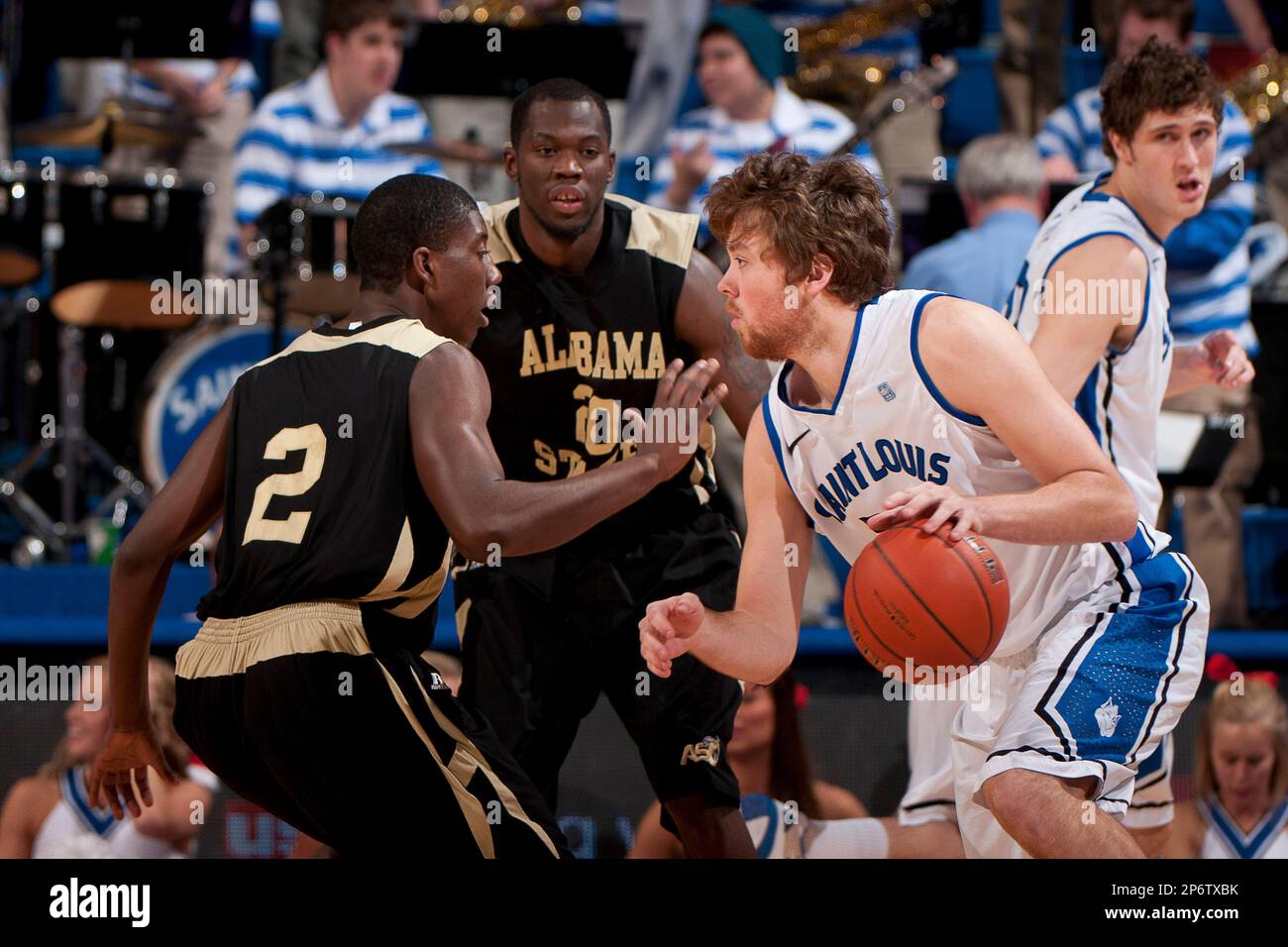 Kyle Cassity (23) of the Saint Louis Billikens moves past Luther Page (2) of the Alabama State ...