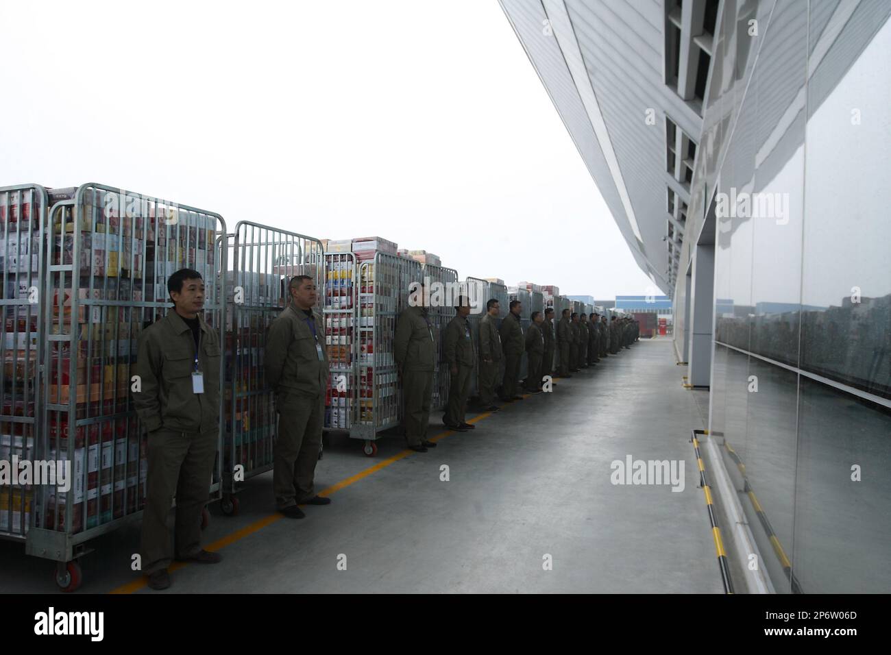Employees work at the Chengdu Tobacco Logistics Center in Chengdu in ...