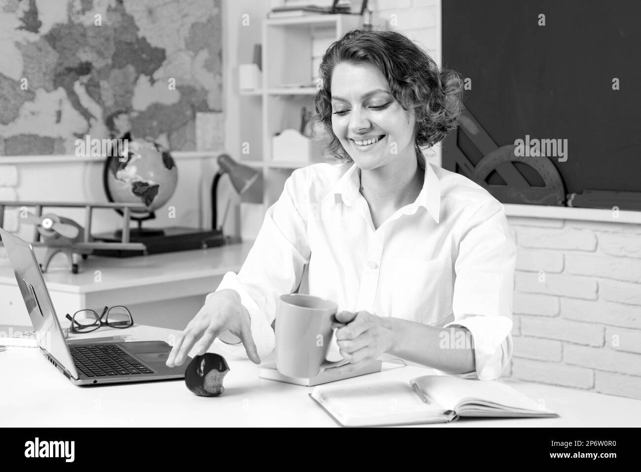 School teacher lunch. Eating in classroom. Education, study and ...