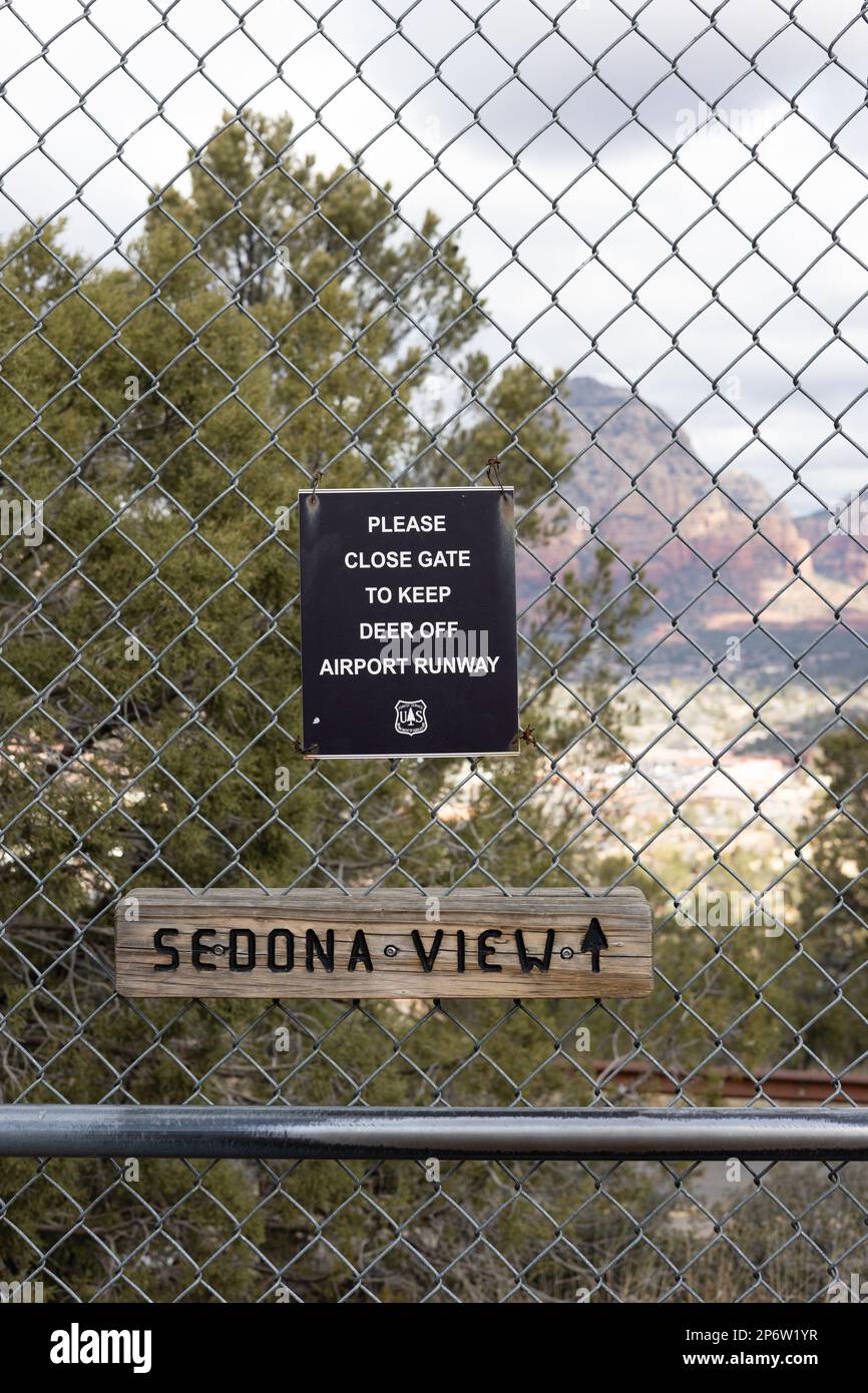 A gate at the Sedona Airport loop trail warning people to close gate to ...