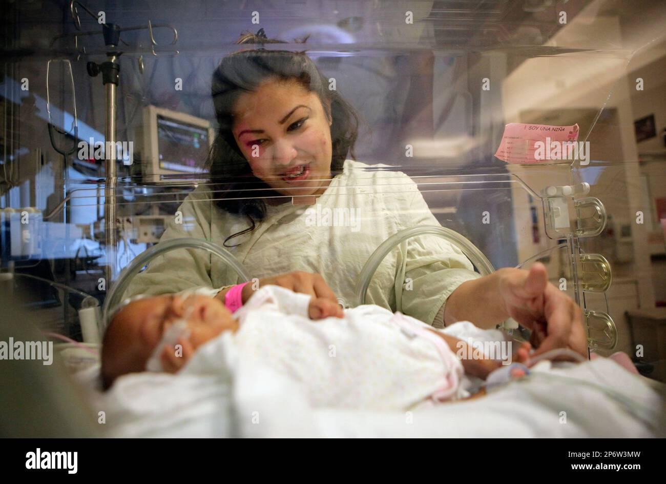 Haydee Ibarra looks at her 14-week-old daughter, Melinda Star Guido, at ...