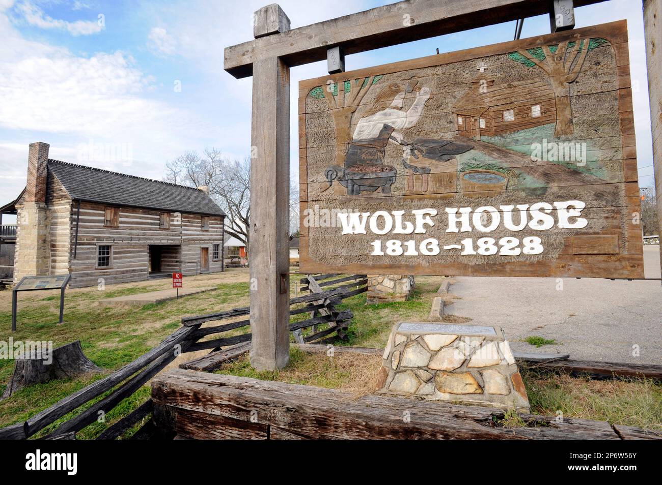 The Wolf House in Norfork , Ark., features a sign carved by nationally ...